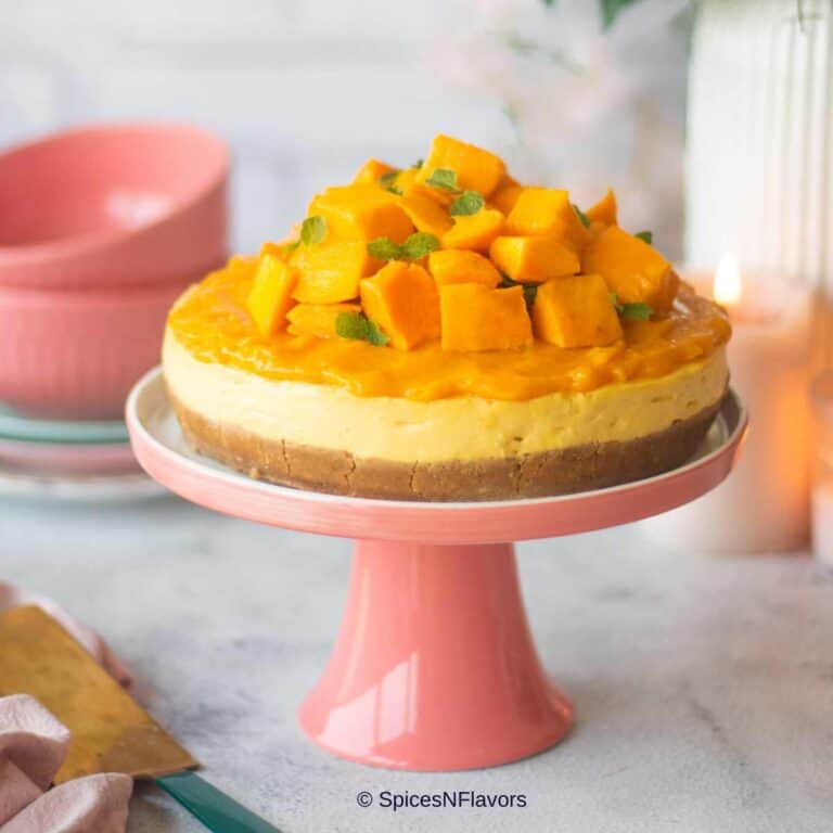 The Best Eggless Baked Mango Cheesecake recipe - Spices N Flavors