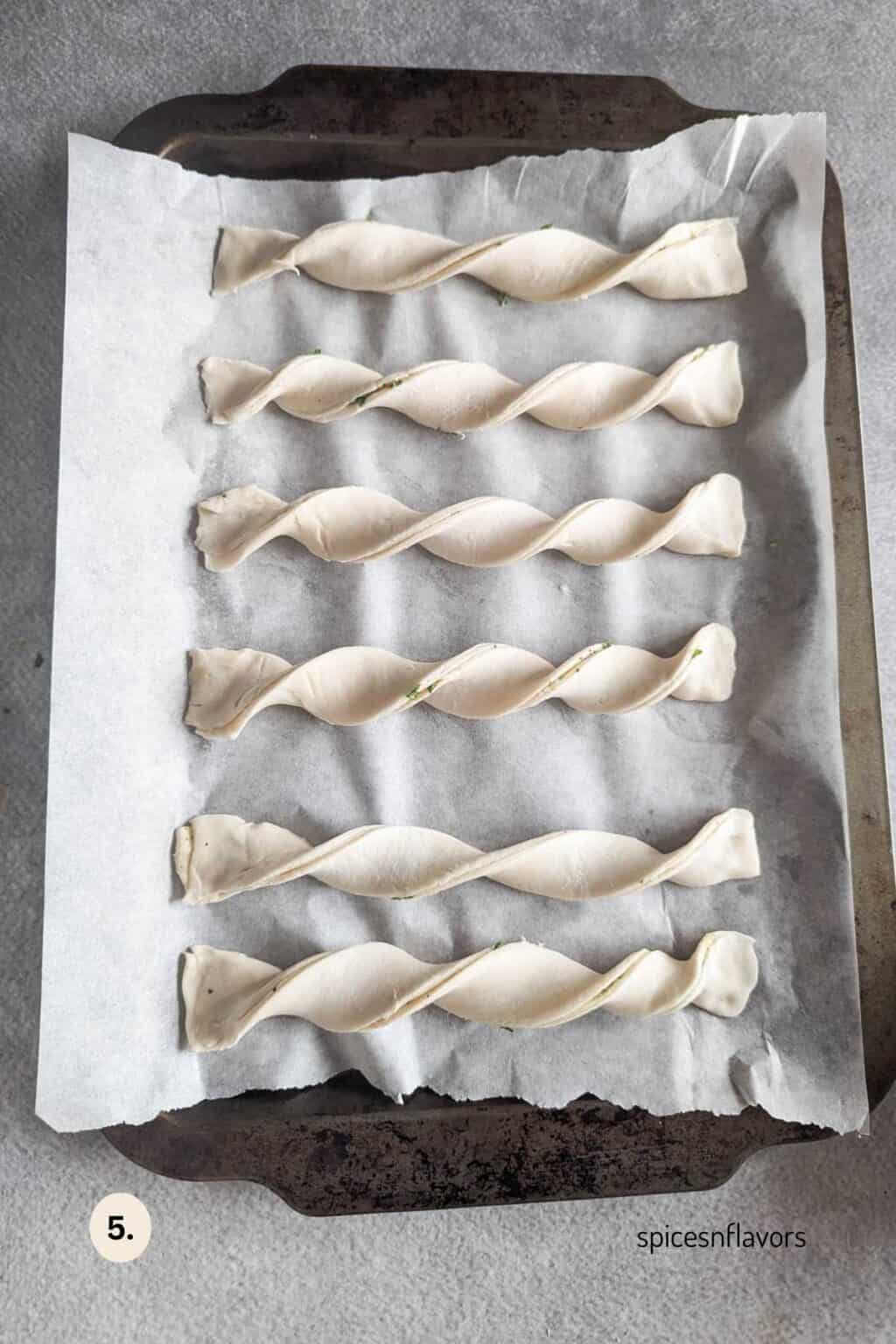 Super Easy Cheesy Garlic Puff Pastry Twists recipe - Spices N Flavors