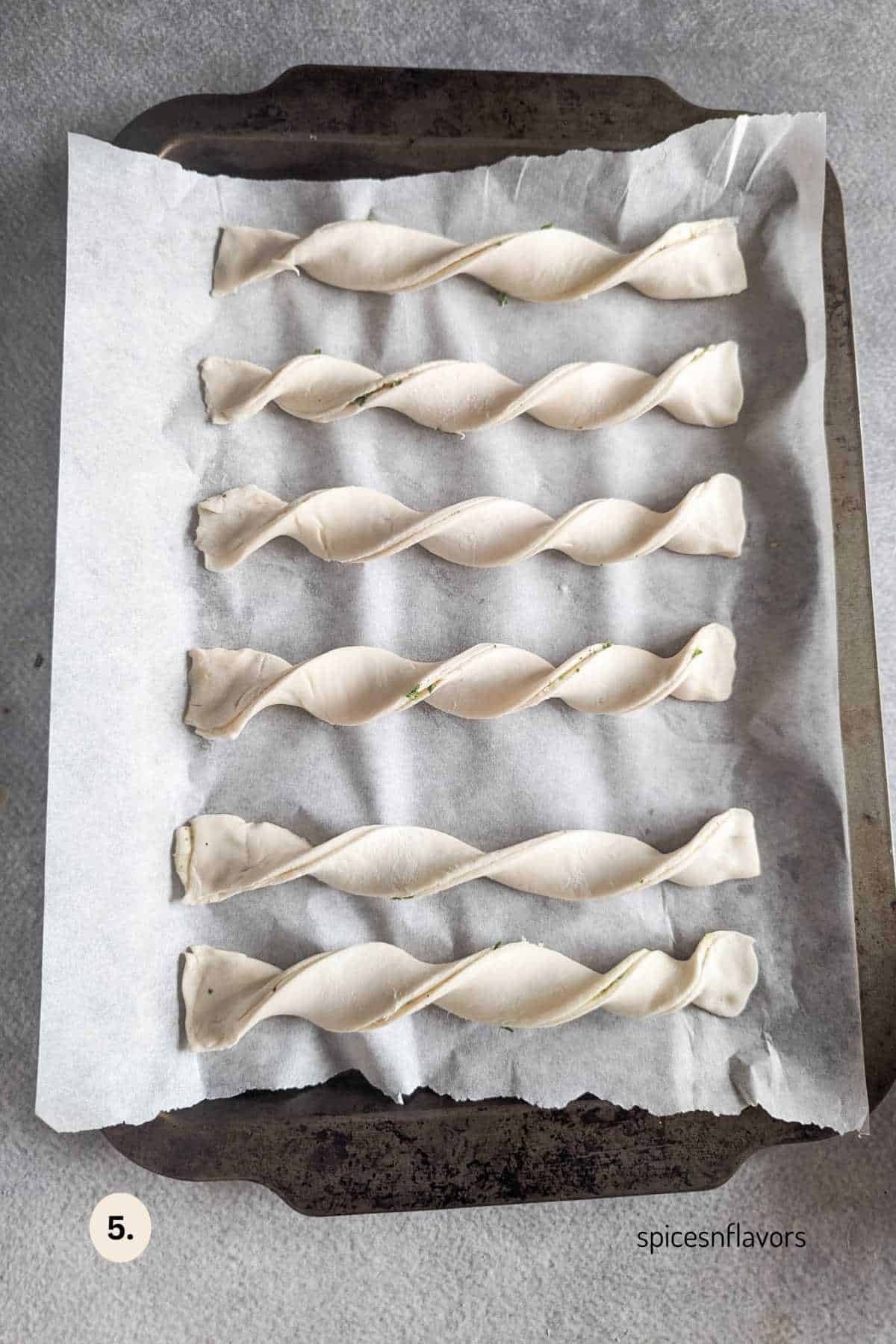 Super Easy Cheesy Garlic Puff Pastry Twists recipe - Spices N Flavors